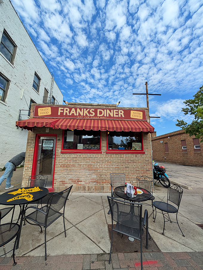 Wisconsin weather permitting, outdoor seating offers fresh air with your fresh coffee. The diner's iconic sign promises exactly what it delivers.