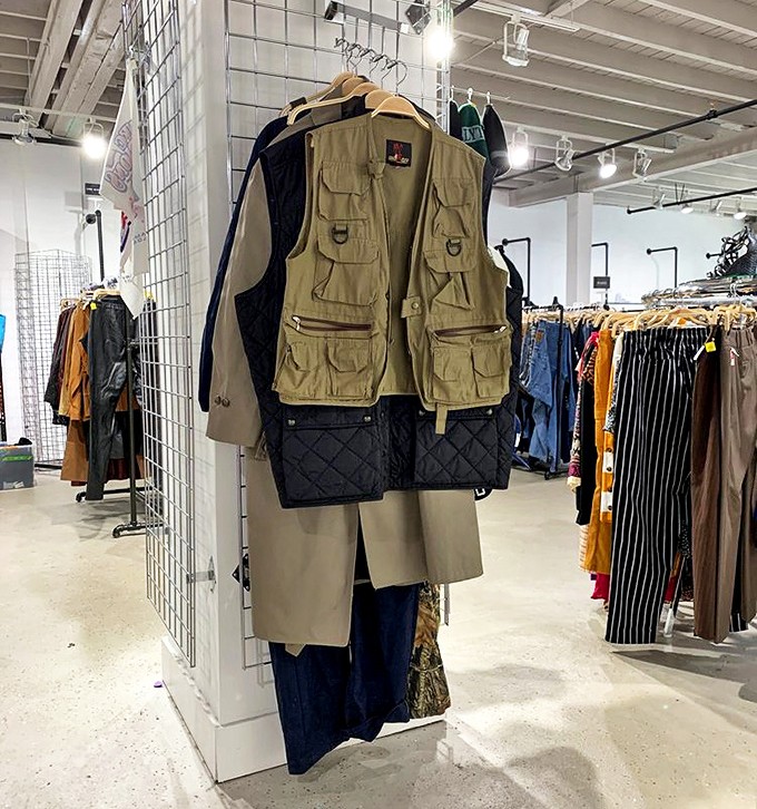 Utility meets fashion in this fishing vest display &ndash; because sometimes the most unexpected vintage pieces become your new wardrobe heroes.