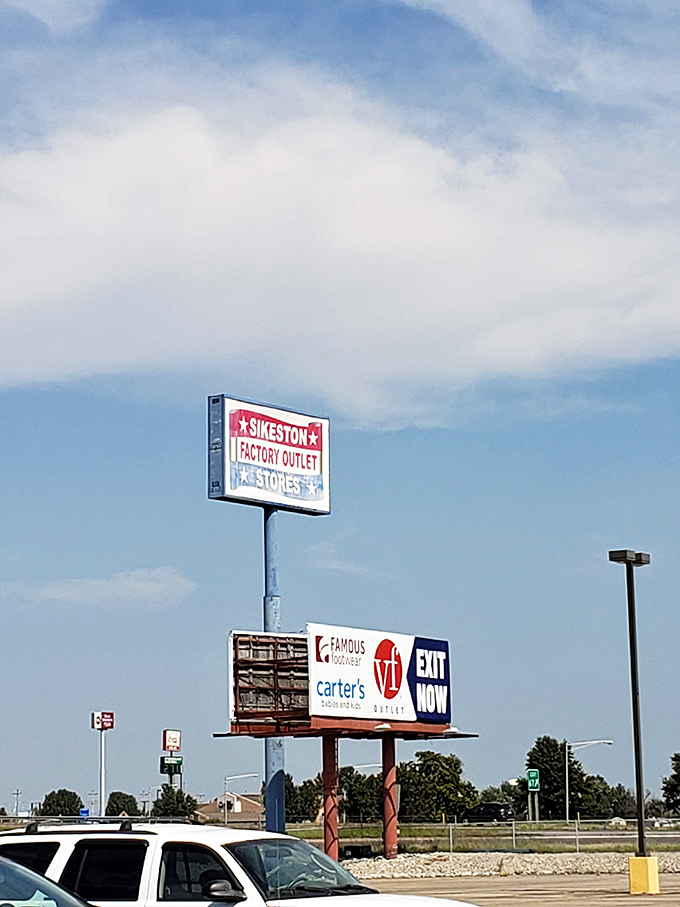 Highway signage points the way to retail salvation, where smart shoppers go to stretch their dollars.