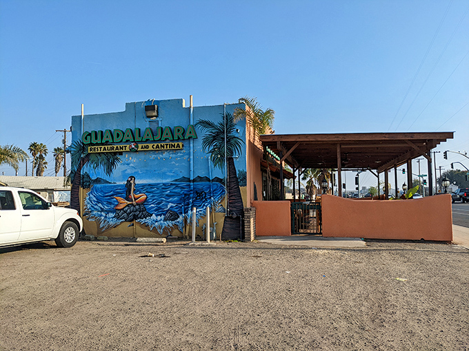 The thatched roof details and colorful murals make this corner location impossible to miss, like a vacation spot in your own city.