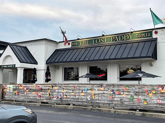 The festive exterior with colorful flags and the iconic green, white, and orange of Ireland beckons passersby to step in for a pint and stay for dinner.