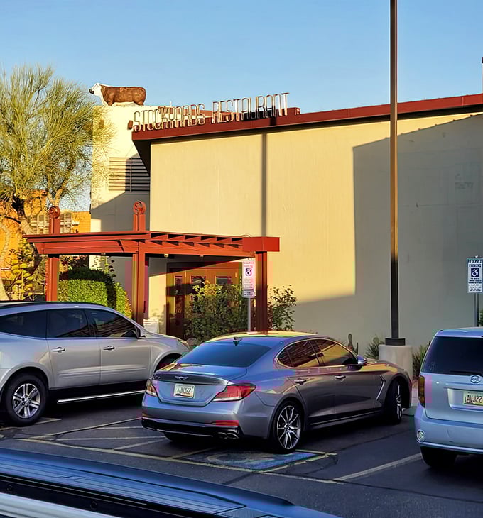 Even from the outside at dusk, The Stockyards promises an evening of culinary delight&mdash;that cow on the roof has been watching over happy diners for decades.
