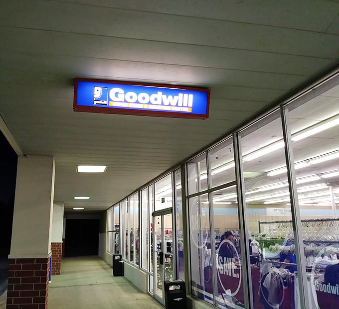 That illuminated storefront sign calls to bargain hunters like a beacon in the Mississippi night sky.