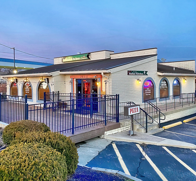 As dusk falls, Jimmy's Italian Kitchen glows like a beacon of culinary comfort in the Kettering landscape.