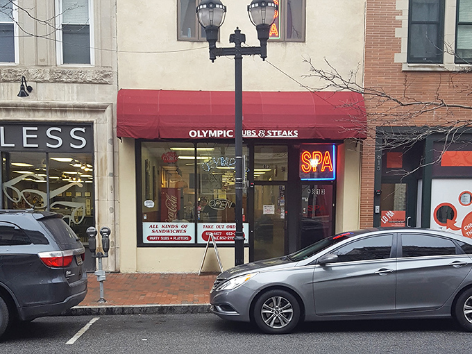 From the street, Olympic looks like just another storefront, but locals know it's actually the gateway to cheesesteak paradise.