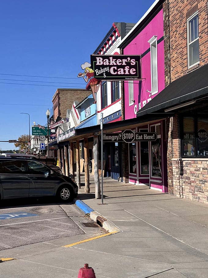 Downtown Custer's main street, where the bright pink Baker's Bakery & Cafe beckons like a delicious oasis in the Black Hills.