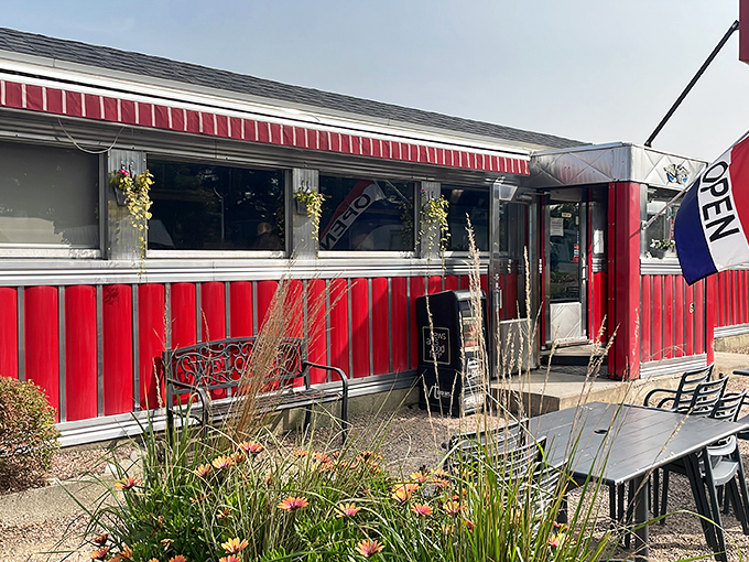 The cheerful exterior with ornamental grasses and flowers softens the diner's vintage industrial edges&mdash;like comfort food with a side of curb appeal.