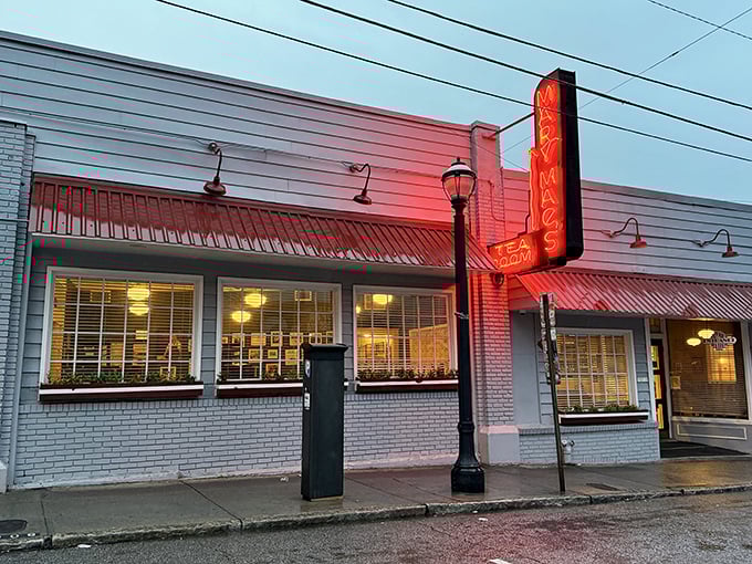 As evening falls, the neon sign glows like a beacon of culinary hope, promising that inside these walls, Southern cooking traditions remain deliciously alive and well.