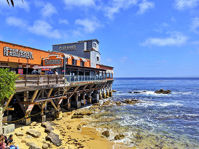 Perched dramatically over the rocks where Monterey Bay meets land, Fish Hopper looks like it was designed by someone who understood that great seafood deserves a great backdrop.
