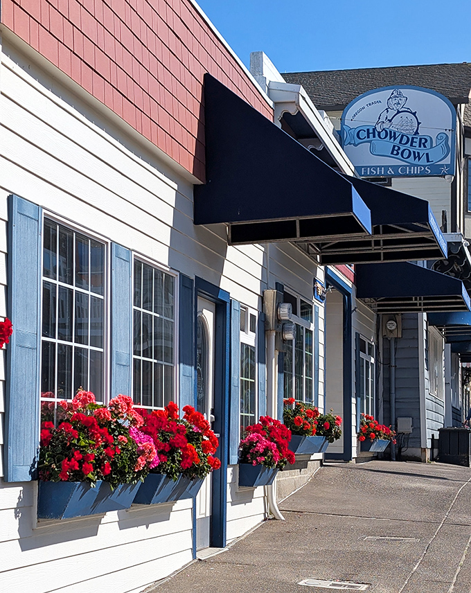 Red geraniums pop against blue shutters and white siding&mdash;it's like the restaurant dressed up in nautical colors just for your arrival.f
