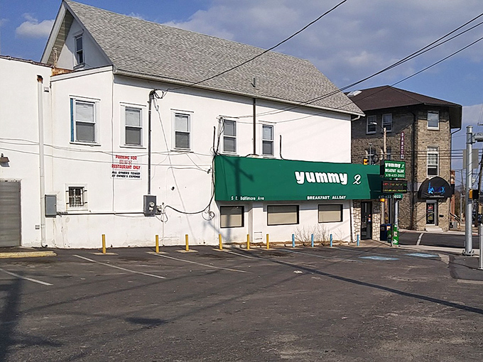 The modest exterior sits confidently at the corner, knowing it doesn't need flash when you're serving Delaware County's finest chicken.