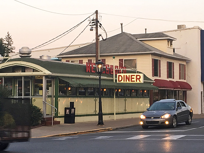 As evening approaches, the Wellsboro Diner's neon glow becomes a beacon for hungry travelers and locals alike&mdash;a promise of comfort that never dims.