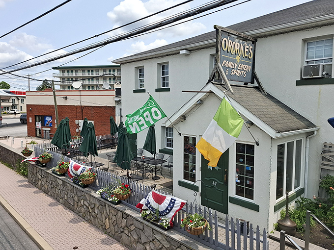 The Irish flag flutters proudly alongside the building, a colorful beacon signaling that good food, drink, and company await just inside.