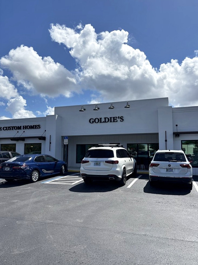 Even the Florida sky seems to celebrate Goldie's, with perfect clouds framing a restaurant that's become a true Naples institution.