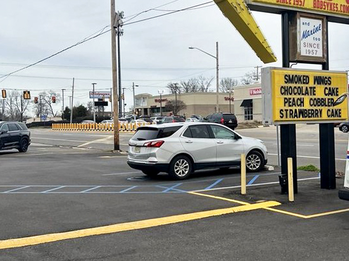 Even the parking lot feels special—like the last few steps of a pilgrimage before reaching the promised land of perfect barbecue.