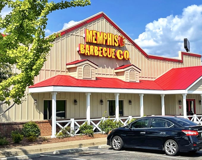 A welcoming porch and bright yellow sign – like your grandmother's house, if your grandmother happened to be a world-champion pitmaster.