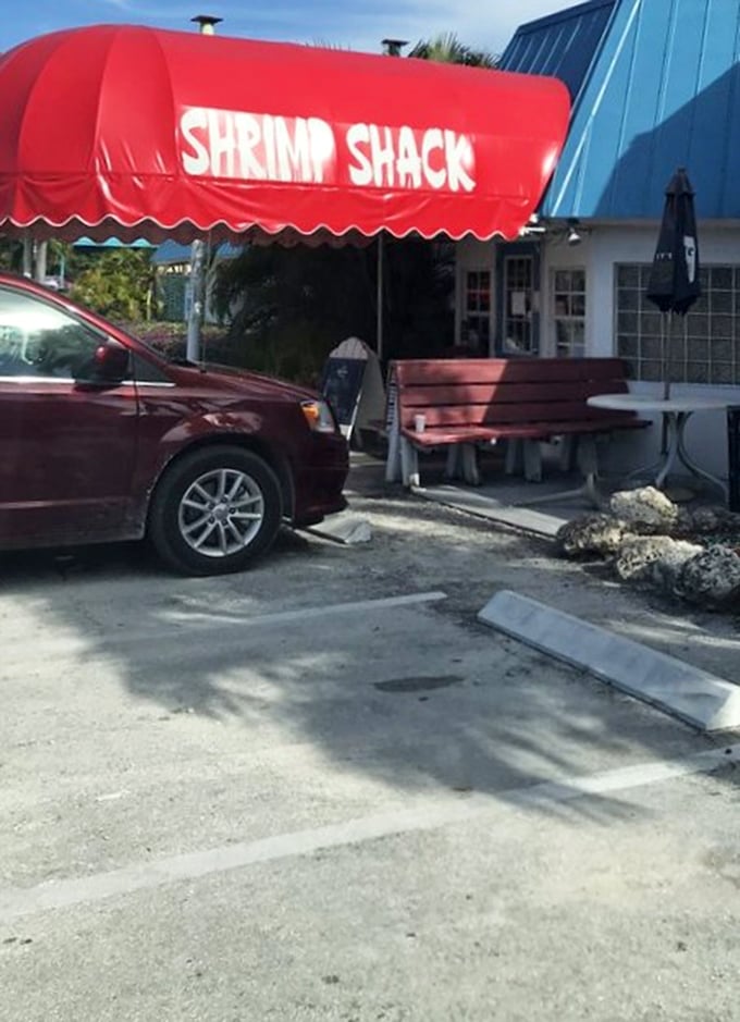 The humble parking lot might not look like much, but it's the gateway to one of Florida's most cherished culinary treasures.