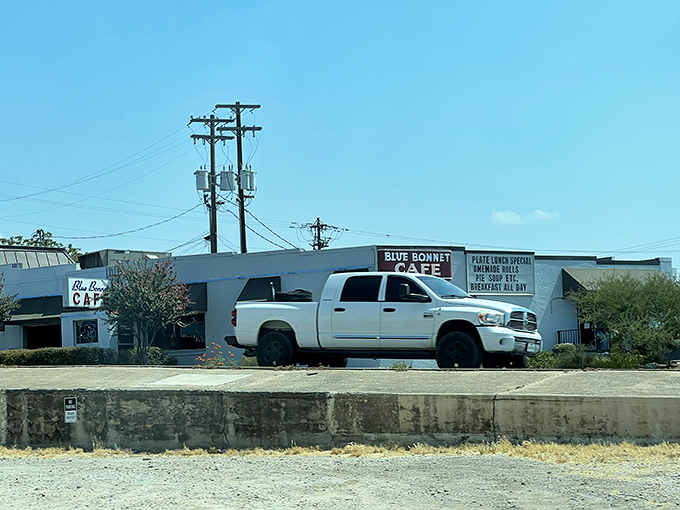 Even from the road, that iconic sign draws in hungry travelers like moths to a flame. Texas-sized trucks for Texas-sized appetites.