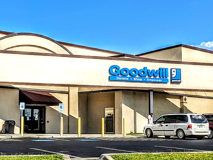 Blue skies and blue signage: a perfect Kansas day for treasure hunting. Your next favorite outfit is just steps away through those doors.