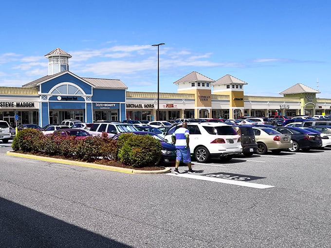 The blue and yellow fa&ccedil;ades of Tanger's storefronts create a cheerful shopping landscape that's as inviting as the deals waiting inside.