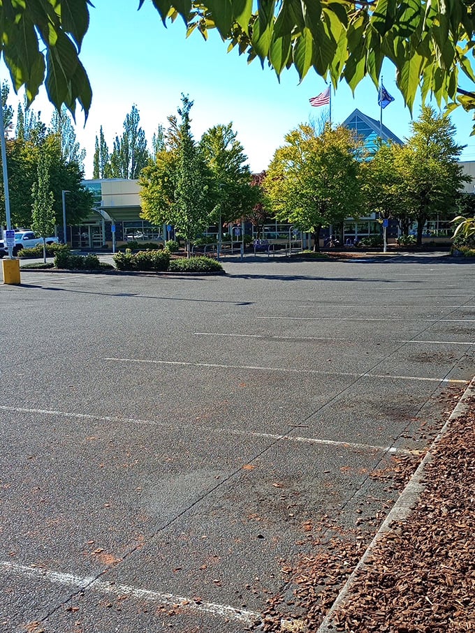 A spacious parking lot surrounded by Portland's signature greenery&mdash;because the universe knows you'll need trunk space for all your thrifted treasures.
