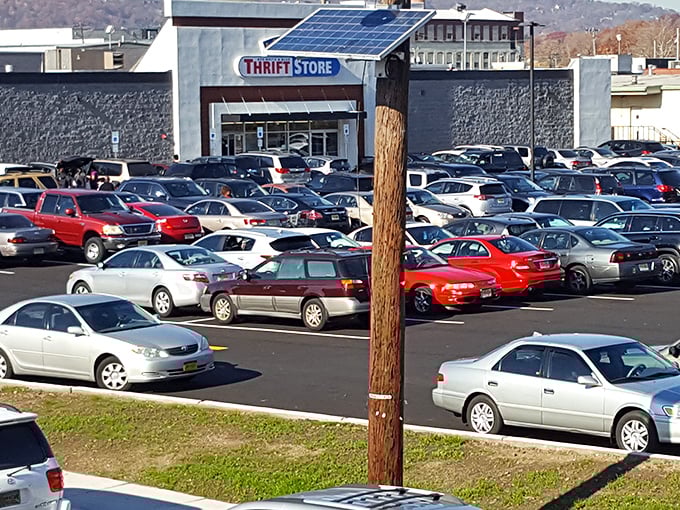 A packed parking lot tells the real story&mdash;this isn't just shopping, it's a community event. Every car represents someone's quest for the perfect find.