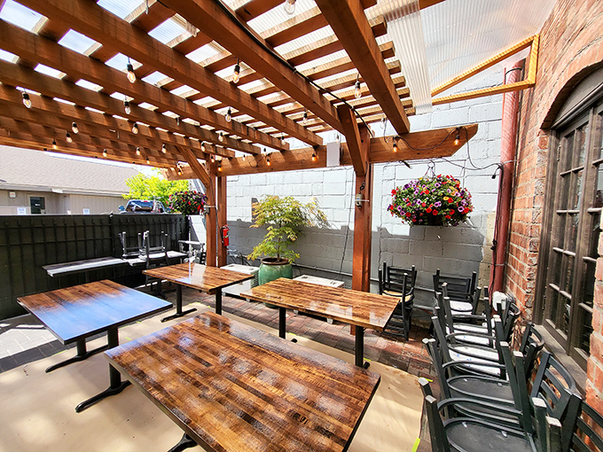 The sunny patio with its pergola overhead offers the perfect spot for lingering over lunch on beautiful days.