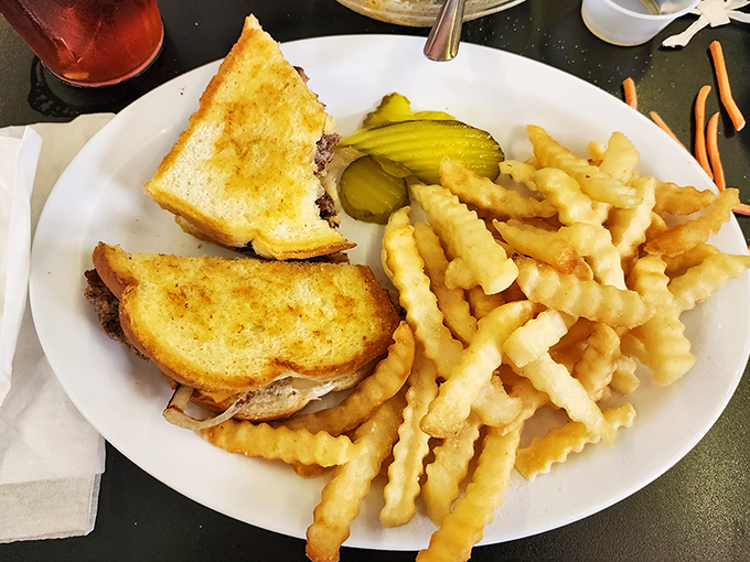 The patty melt with crinkle fries - a diner classic executed with the kind of precision that reminds you why some food traditions never go out of style.
