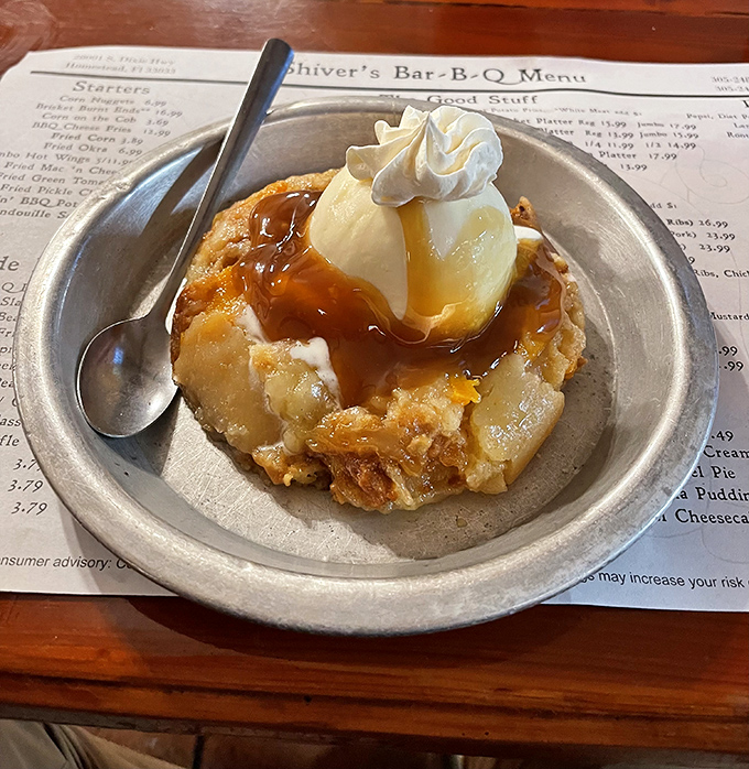 This isn't just peach cobbler&mdash;it's warm Southern comfort with a scoop of vanilla ice cream performing its sacred duty of melting into every nook and cranny.