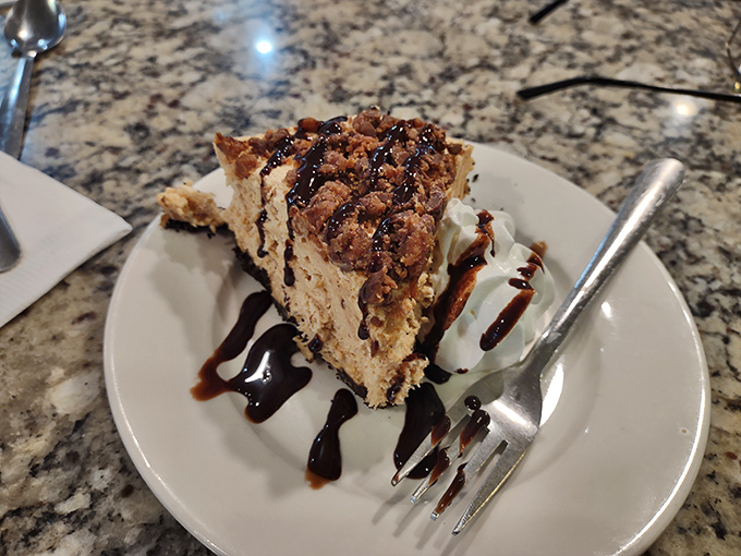 Peanut butter pie that would make Elvis weep&mdash;a cloud-like filling on chocolate crust with just enough drizzle to make it Instagram-worthy.