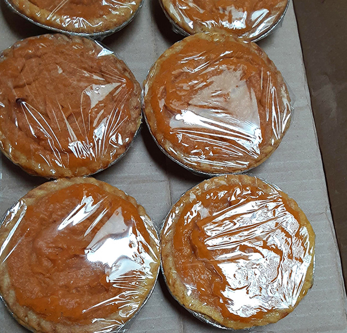 Sweet potato pies waiting for their moment to shine. After a barbecue feast, these aren't just dessert &ndash; they're the encore performance.