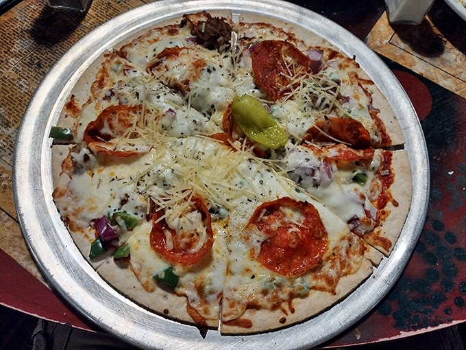 A pizza that doesn't try to be New York or Chicago style – it's just honestly delicious, with toppings arranged like edible artwork.