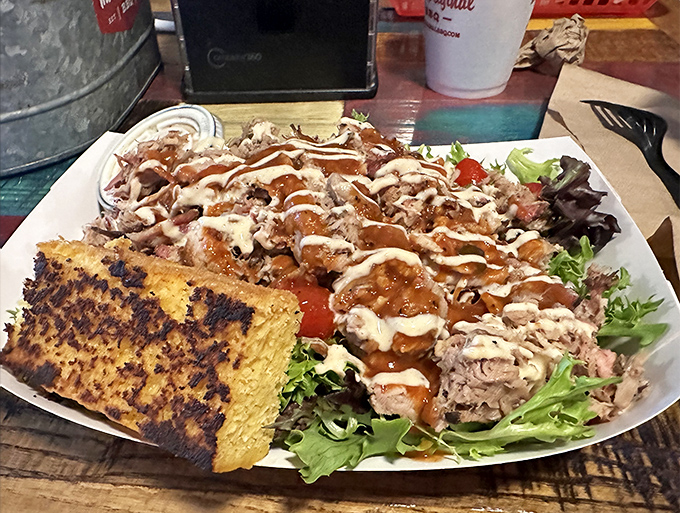 Who said salads can't be indulgent? This pulled pork-topped creation lets you tell yourself you're eating healthy while enjoying every decadent bite. 