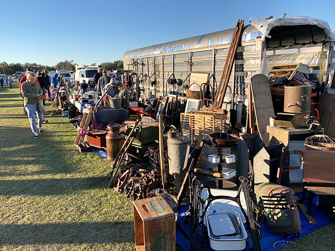 The ultimate flea market tableau&mdash;vintage Americana spilling from a silver trailer like a time capsule on wheels. Every item has a story; every price is negotiable.