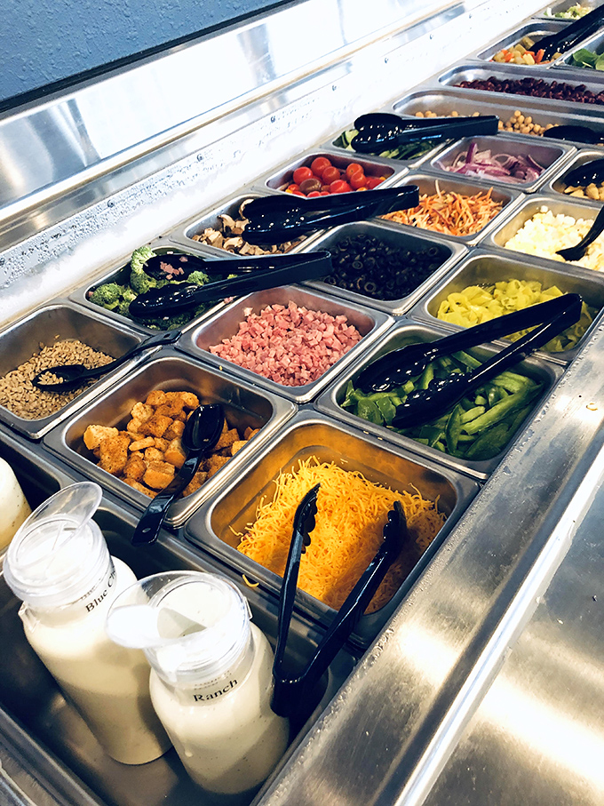The topping bar&mdash;where pizza dreams become reality. Like a painter's palette, but every color tastes better than the last.