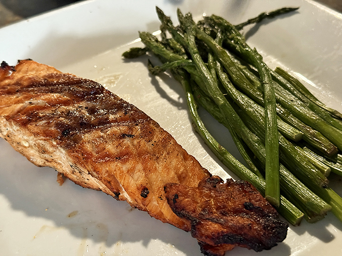 Perfectly grilled salmon with roasted asparagus proves Steis's isn't just about comfort food&mdash;they can nail the healthy options too.