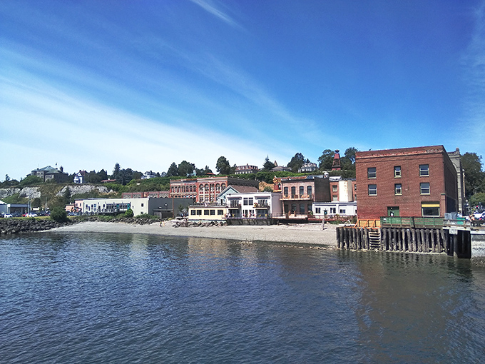 The waterfront buildings of Port Townsend create a perfect postcard view, their facades reflecting both sunlight and the town's enduring relationship with the sea.