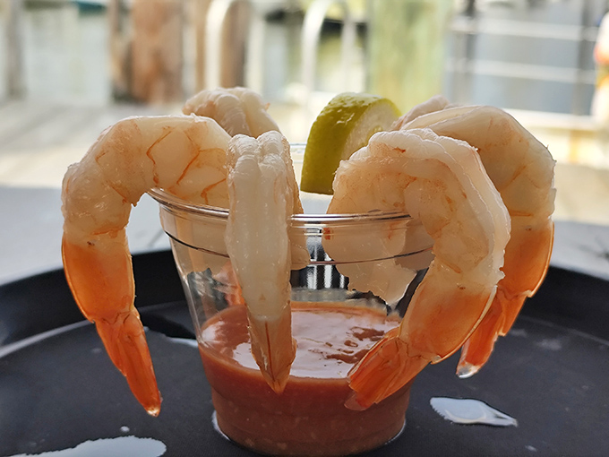 Shrimp cocktail simplicity &ndash; plump, perfectly cooked crustaceans perched on a glass, ready for their tangy sauce bath. Ocean candy at its finest!