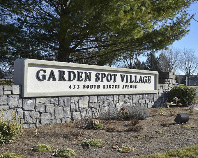 The Garden Spot Village sign stands as the gateway to what might be Pennsylvania's best-kept retirement secret.