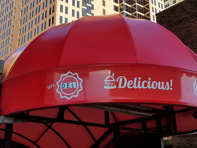 That red awning against Columbus' urban backdrop isn't just a restaurant signature&mdash;it's a landmark for those who know where real flavor lives.