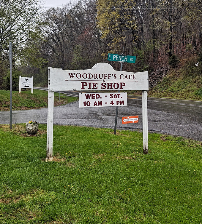 The roadside sign states the essentials: Woodruff's Caf&eacute; & Pie Shop, Wednesday through Saturday, 10-4. Simple, like everything else here. 
