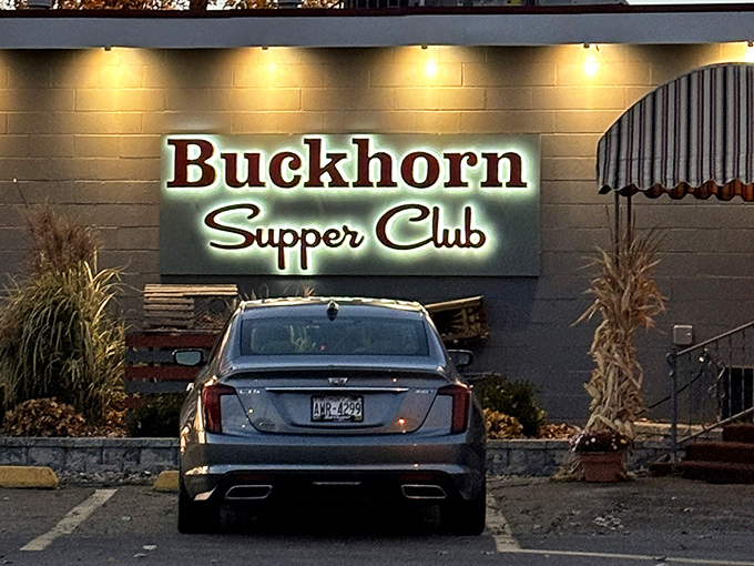 That sign glows like a beacon for the hungry, promising salvation in steak form.