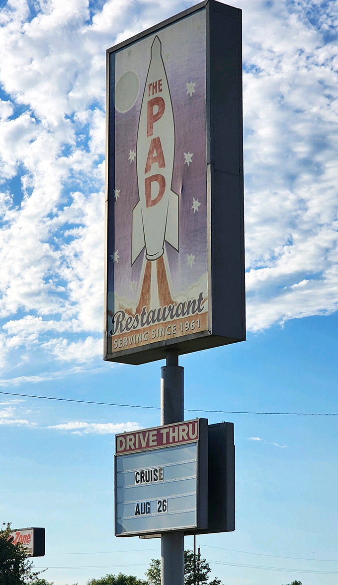 The retro rocket sign, a space-age sentinel promising down-to-earth deliciousness since 1961. Some stars never fade.