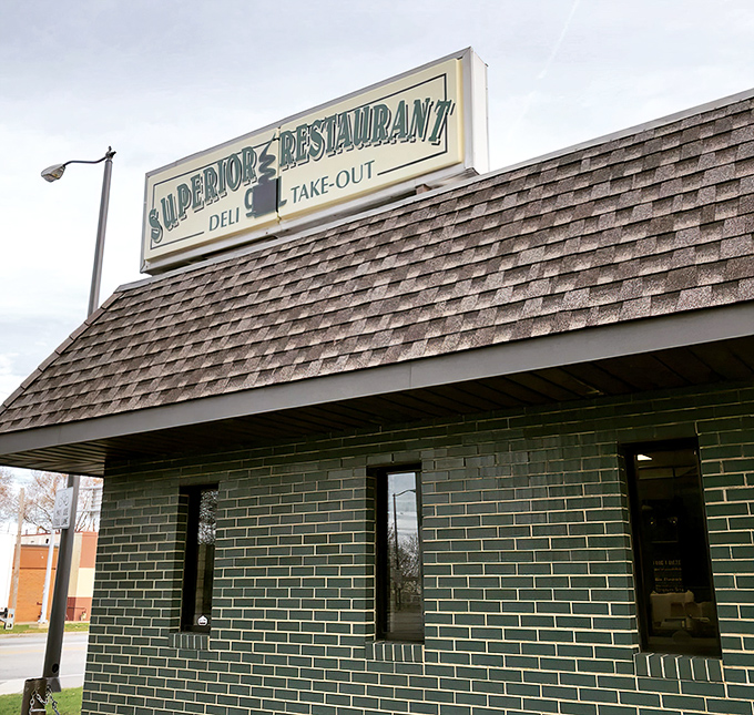 Superior Restaurant signage announcing "Deli & Take-Out" like it's revealing the location of Cleveland's edible gold mine.