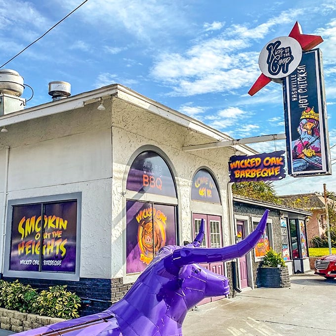 The iconic neon sign glows against the evening sky, a beacon of analog joy in our digital world.