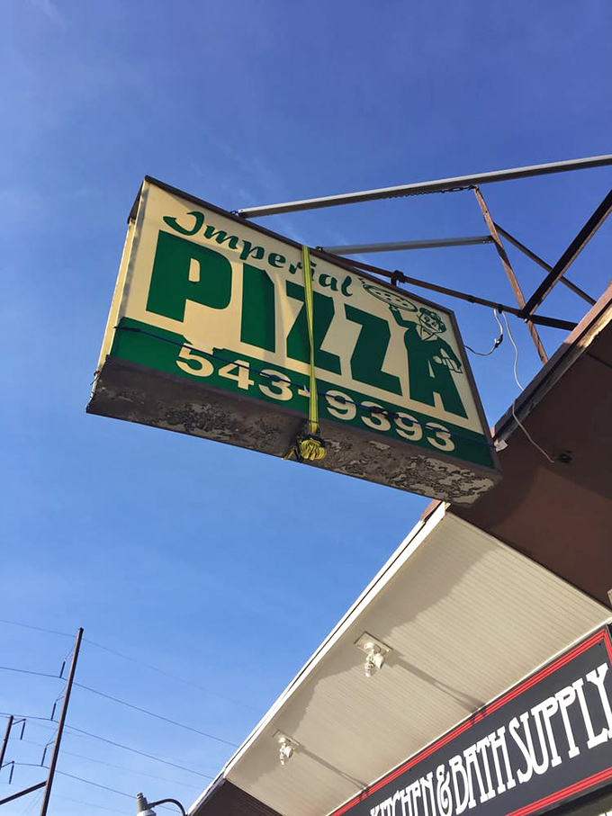 Imperial's vintage signage against a blue Pennsylvania sky. Like a lighthouse guiding hungry souls to pizza salvation.
