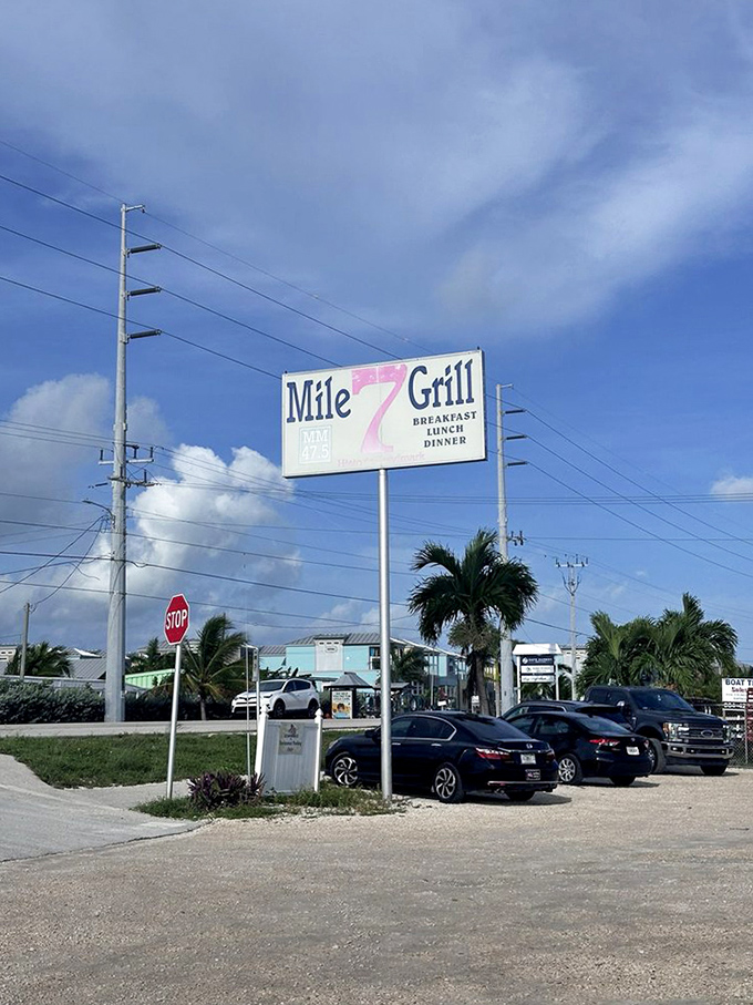 The roadside sign stands tall against the Florida sky, a beacon guiding hungry travelers to their delicious destiny.