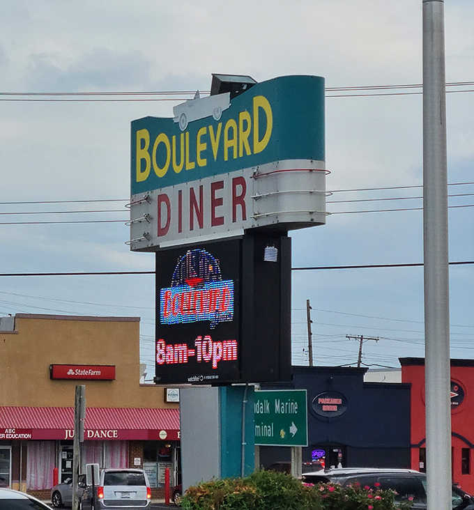 The iconic Boulevard Diner sign stands tall against the Maryland sky, a landmark that's guided generations of hungry locals to their favorite comfort food destination.