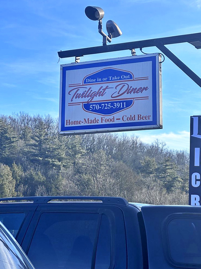 The roadside sign announces "Home-Made Food" with the confidence of someone who knows exactly what you need after a long day.