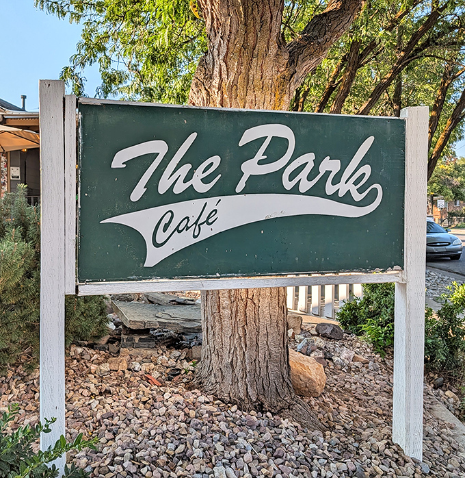 The classic green sign stands as a beacon of breakfast hope&mdash;simple, unpretentious, and promising exactly what it delivers: park-side perfection.
